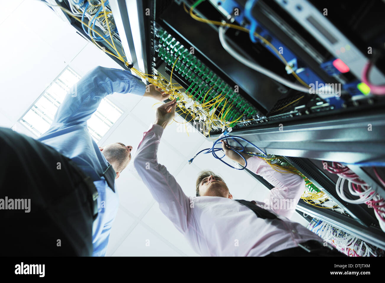 it engineers in network server room Stock Photo - Alamy