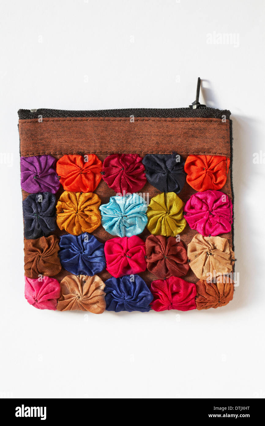 colourful decorative purse bag isolated on white background Stock Photo ...