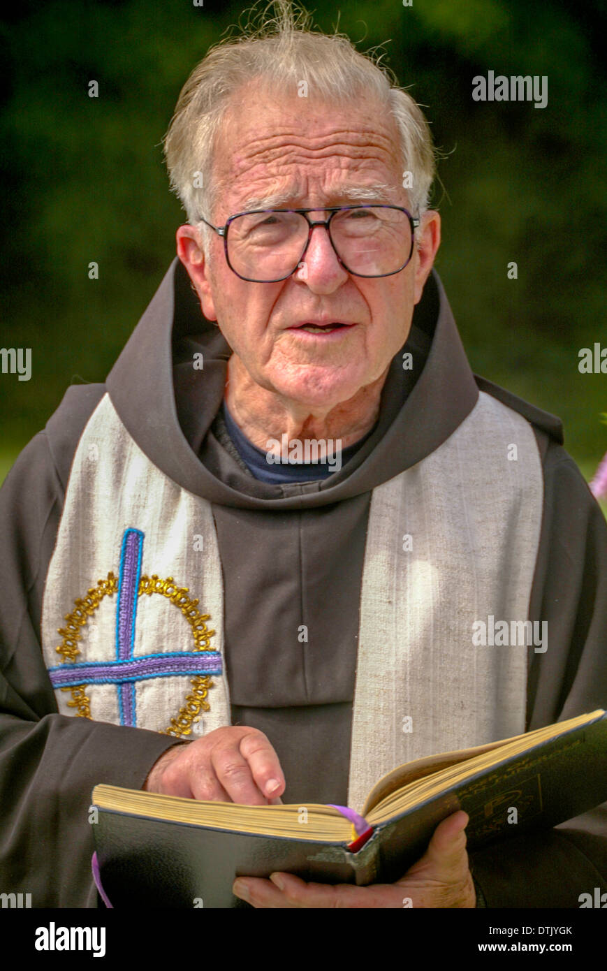 A robed Franciscan priest conducts an outdoor ceremony in Santa Barbara ...