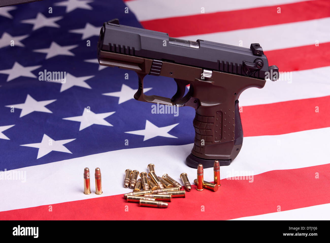Close up of pistol on flag Stock Photo - Alamy