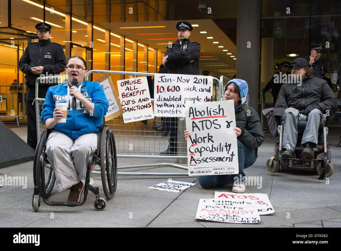 ATOS headquarters, London, UK, 19th February, 2014. A protester speaks ...