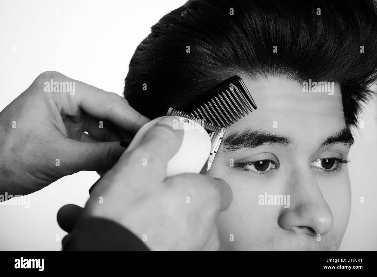 Person getting haircut Black and White Stock Photos & Images - Alamy