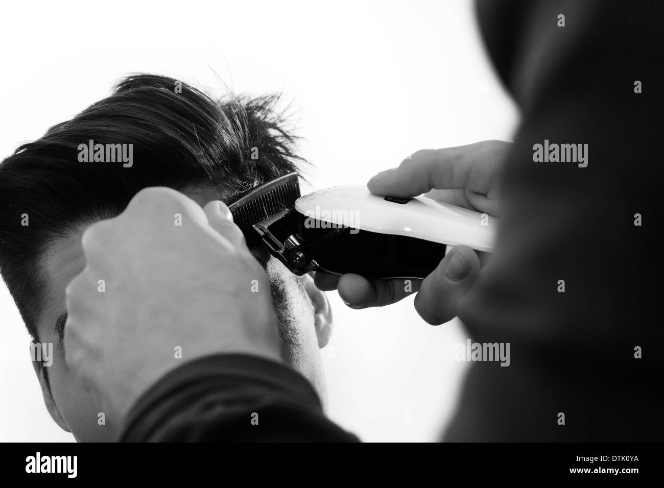 Person getting haircut Black and White Stock Photos & Images - Alamy
