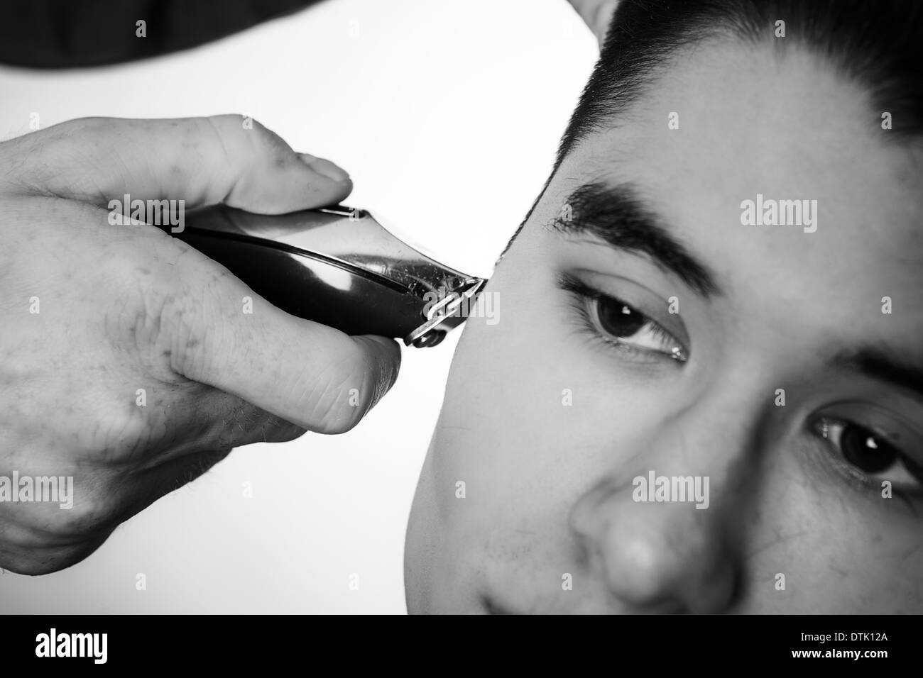 Person getting haircut Black and White Stock Photos & Images - Alamy