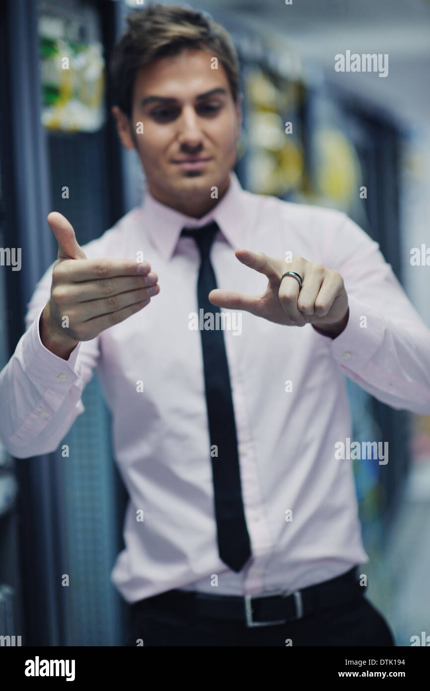 young it engeneer in datacenter server room Stock Photo - Alamy