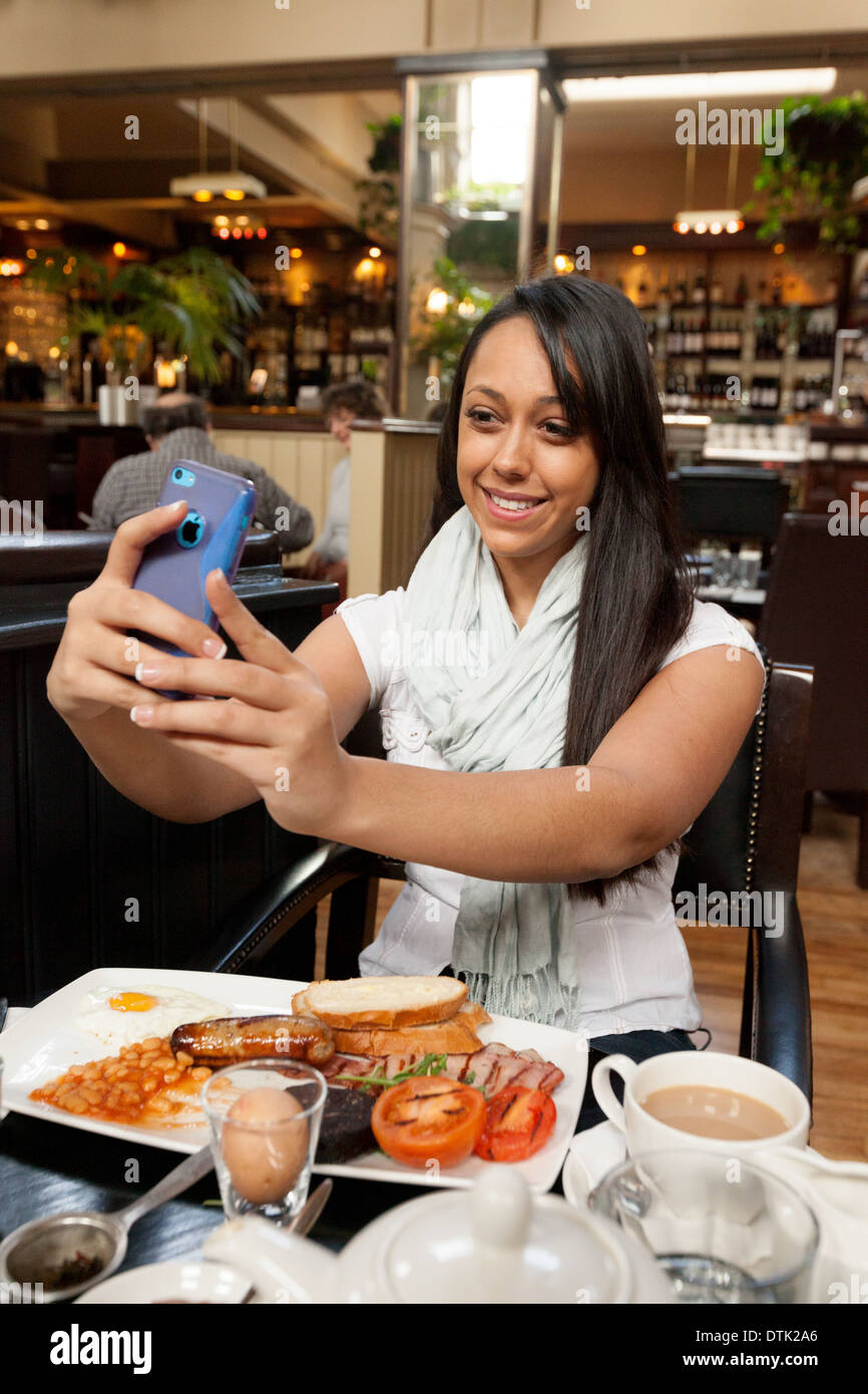 Woman eating full english breakfast hi-res stock photography and images ...