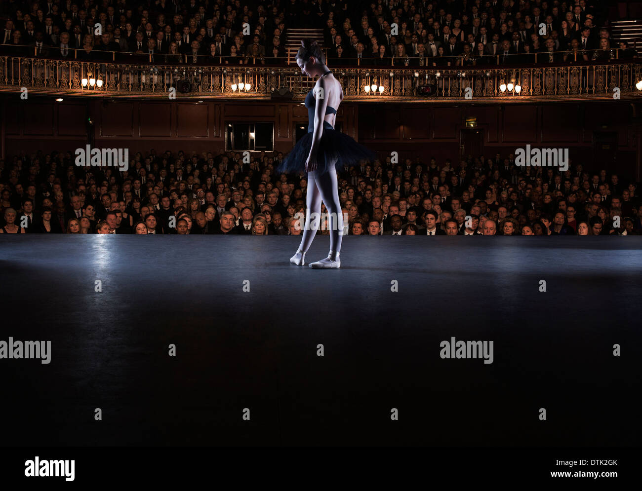 Ballet dancer performing on stage in theater Stock Photo - Alamy