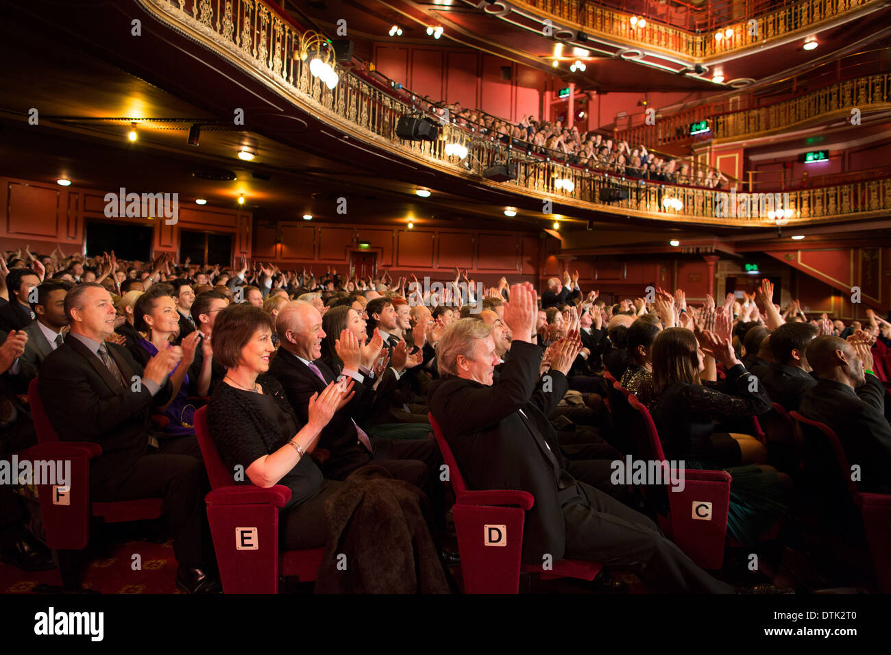 Audience applauding in theater Stock Photo - Alamy
