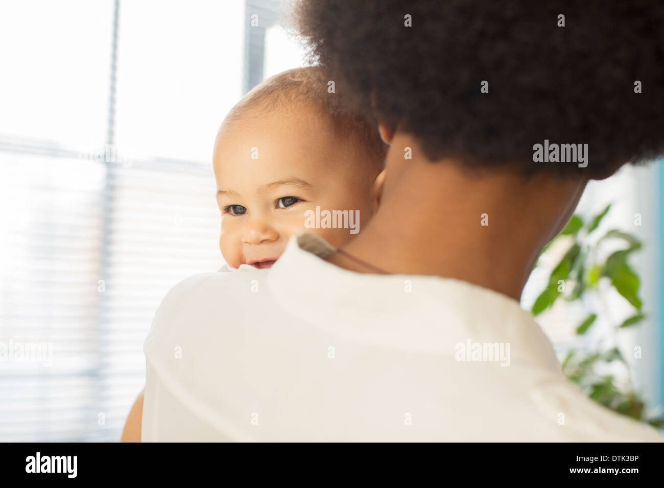 Lady carrying child hi-res stock photography and images - Alamy