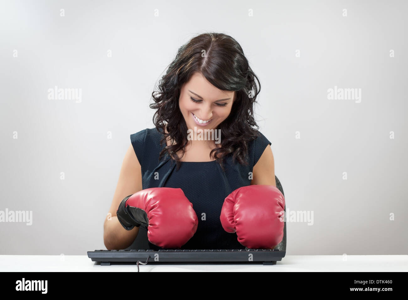 Woman wearing gloves sitting hi-res stock photography and images - Alamy