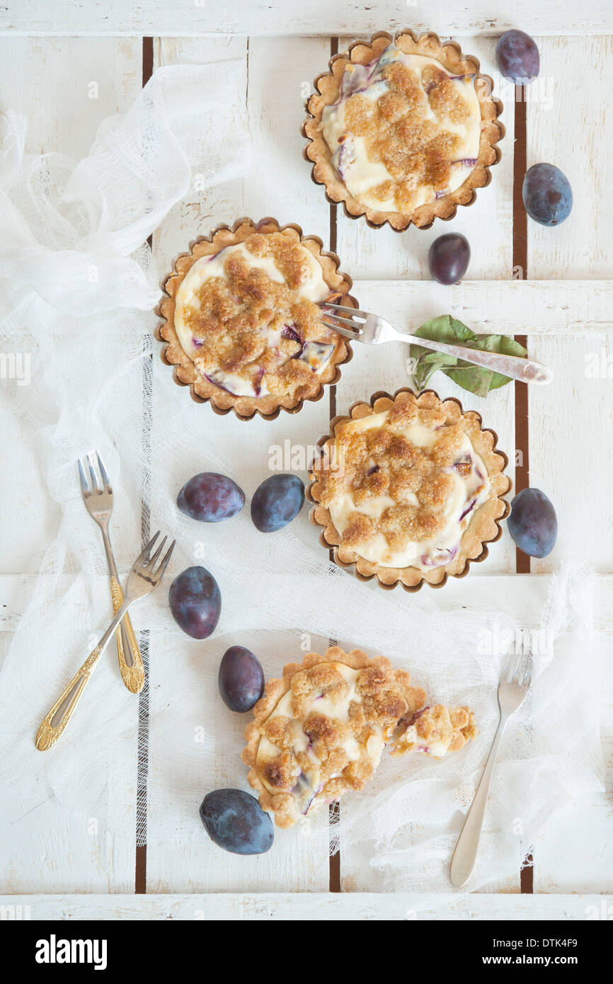 Top view of delicious little pastry tarts with fresh plums Stock Photo ...