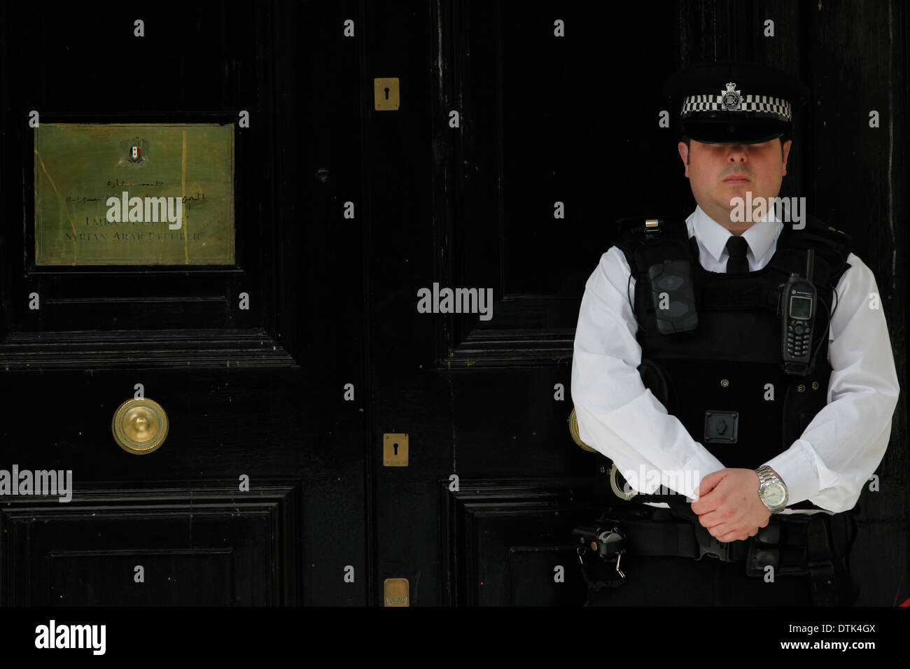 Metropolitan police officer is seen in front of the Syrian embassy in ...