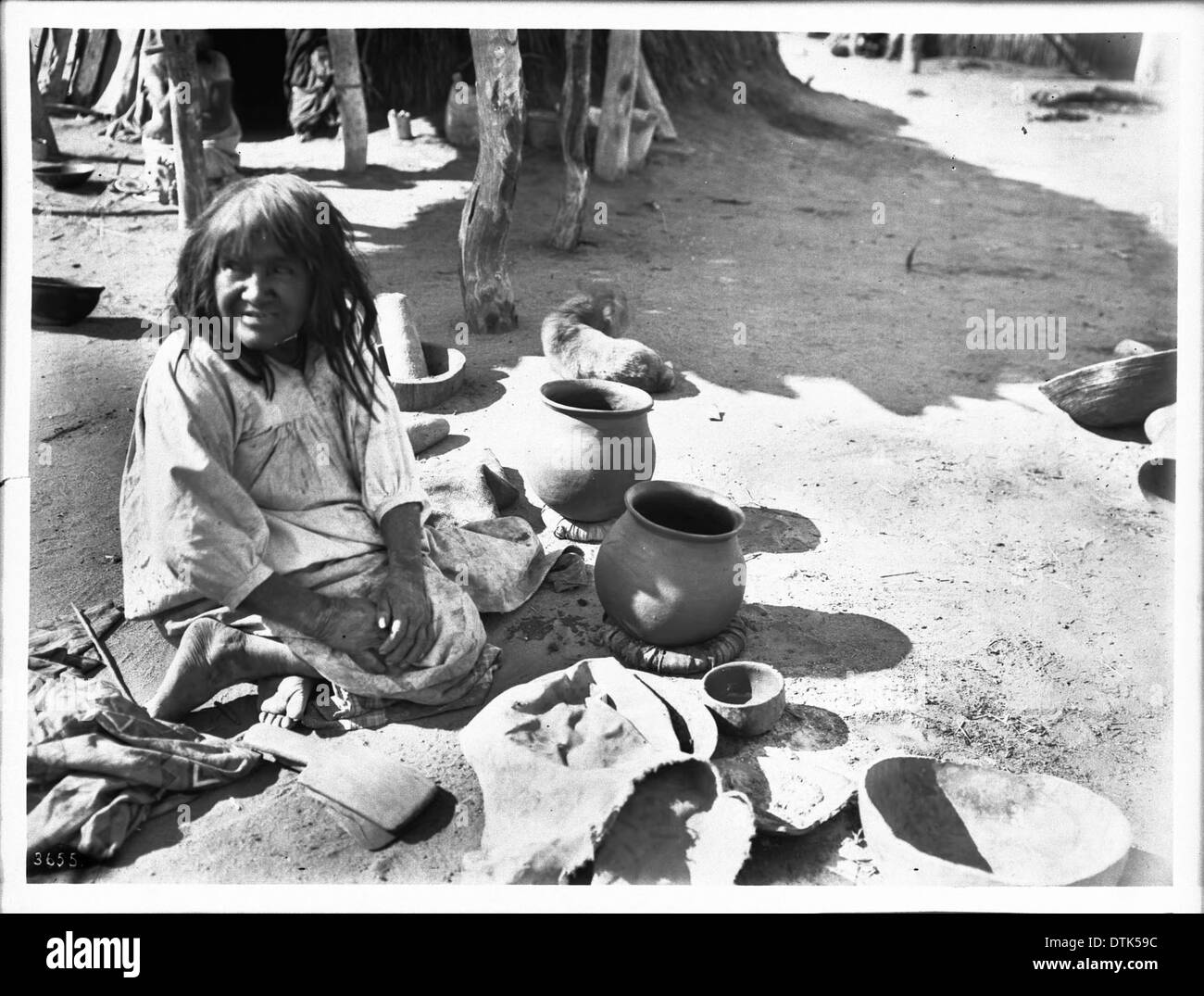 This photograph shows a Pima Indian woman named Si-Rup with her 'Ollas ...