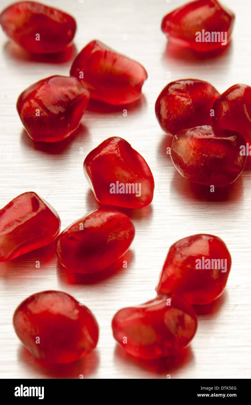 Shiny red seeds hi-res stock photography and images - Alamy