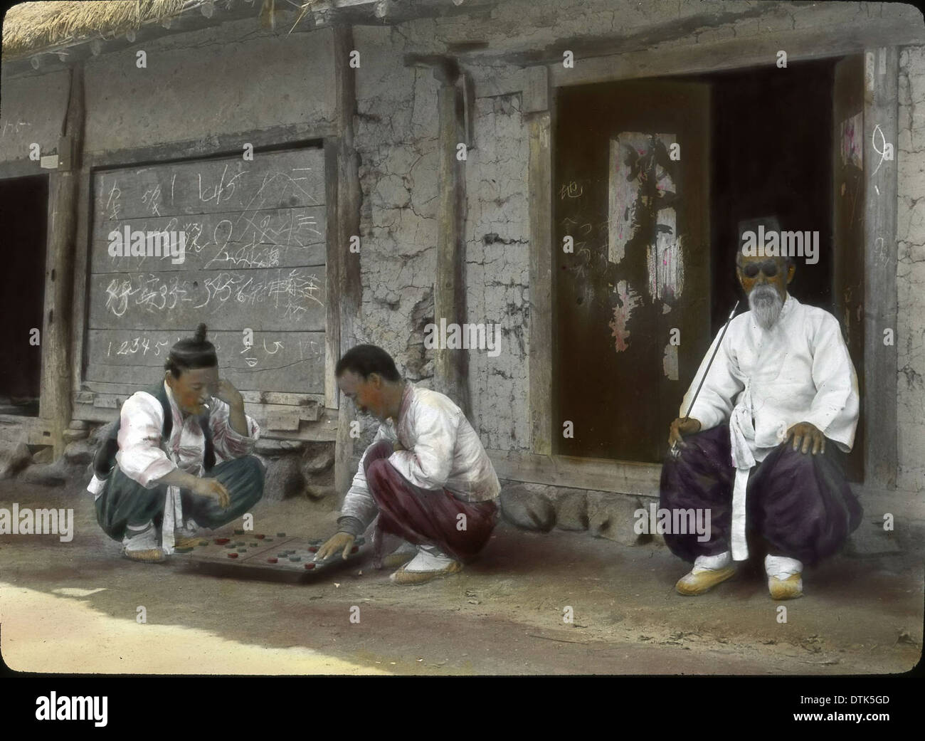 This photograph depicts individuals playing chess in Korea, taken ...