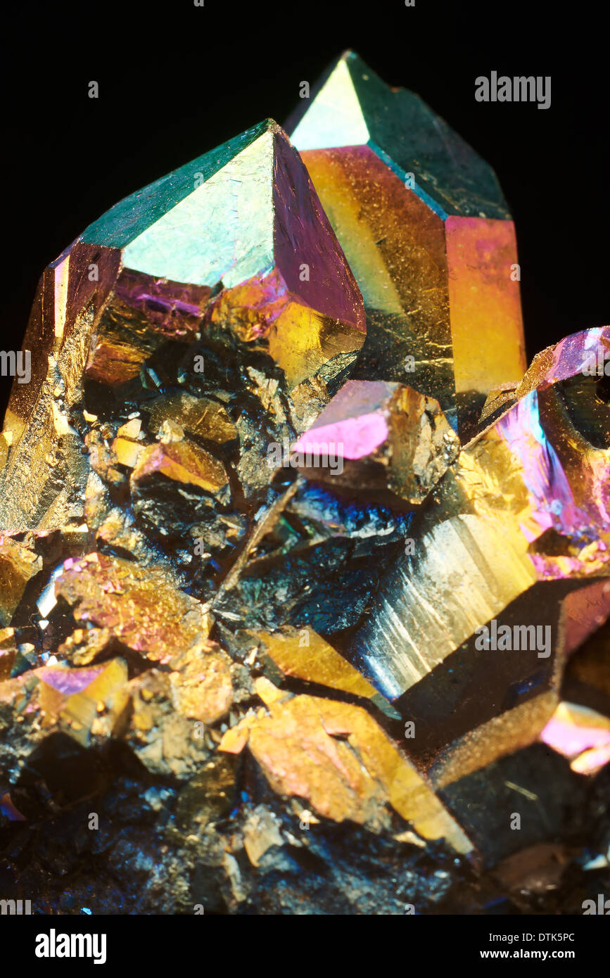 Quartz crystals with titanium deposit Stock Photo - Alamy
