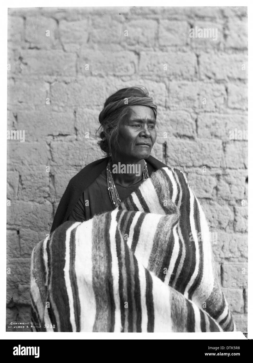 Portrait of a Navajo Indian chieftain standing, taken around 1901 ...