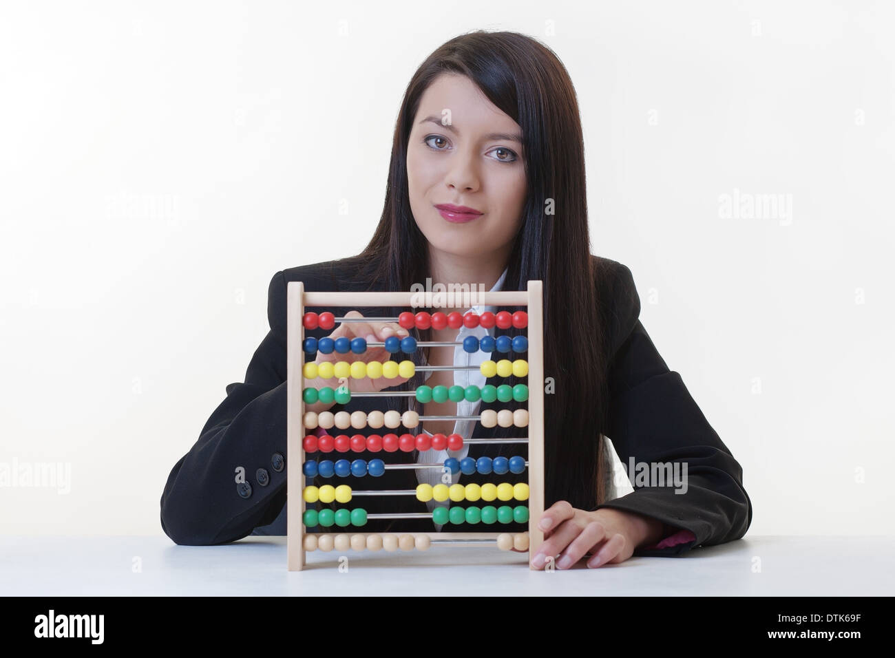 business woman at a desk using a abacus Stock Photo - Alamy