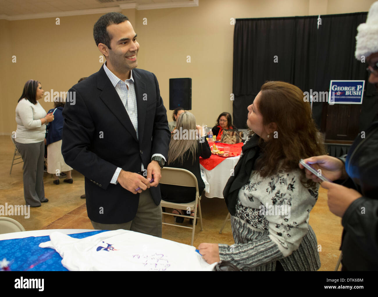 George P. Bush signs shirts as he makes a campaign swing through south ...