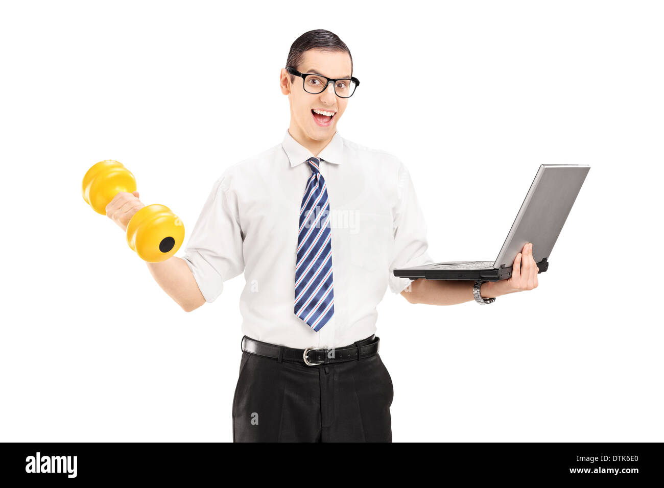 Young businessman holding dumbbell and laptop Stock Photo - Alamy