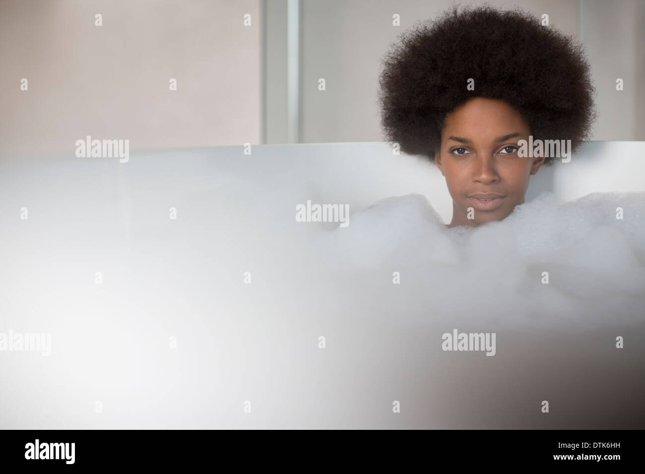 Woman washing hair bubble bath water bathroom hi-res stock photography ...