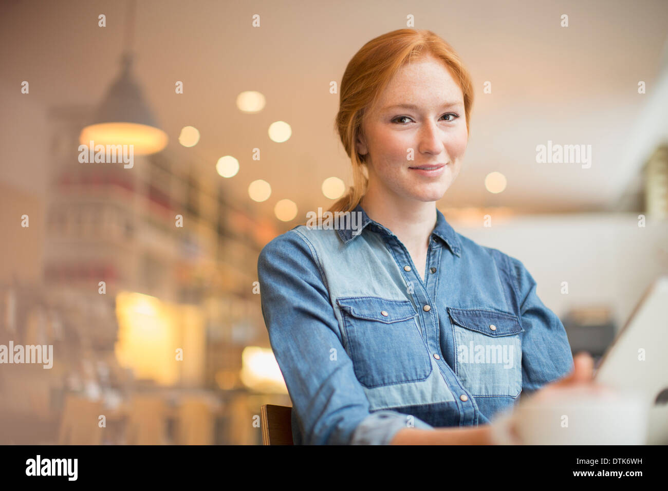 Woman holding menu in cafe Stock Photo - Alamy