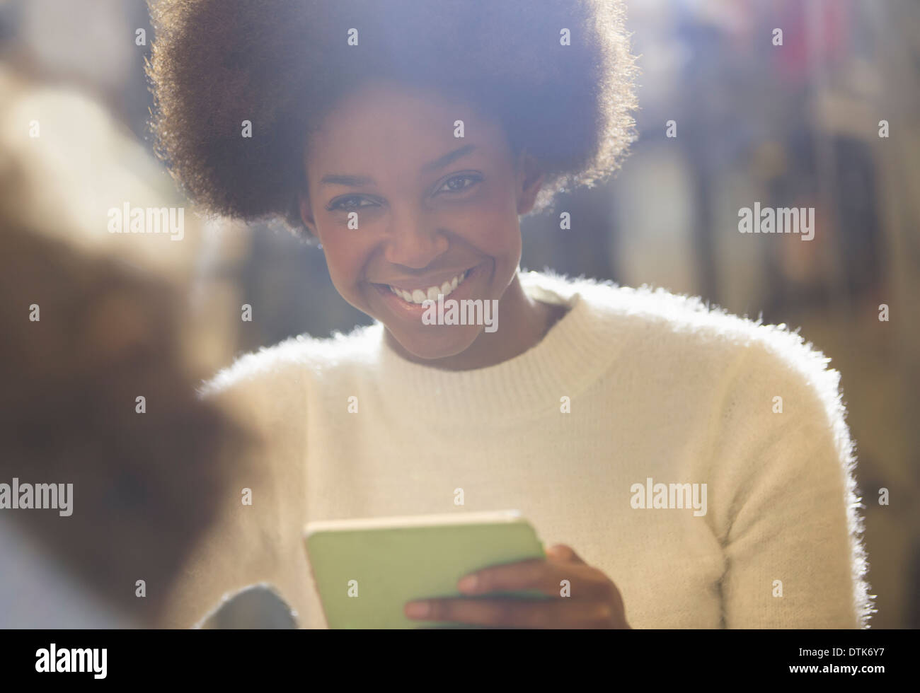 Woman digital tablet listening hi-res stock photography and images - Alamy