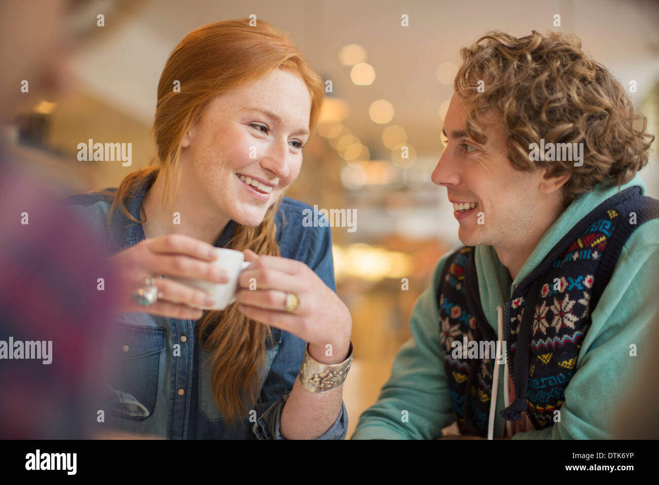 Couple drinking coffee in cafe Stock Photo - Alamy