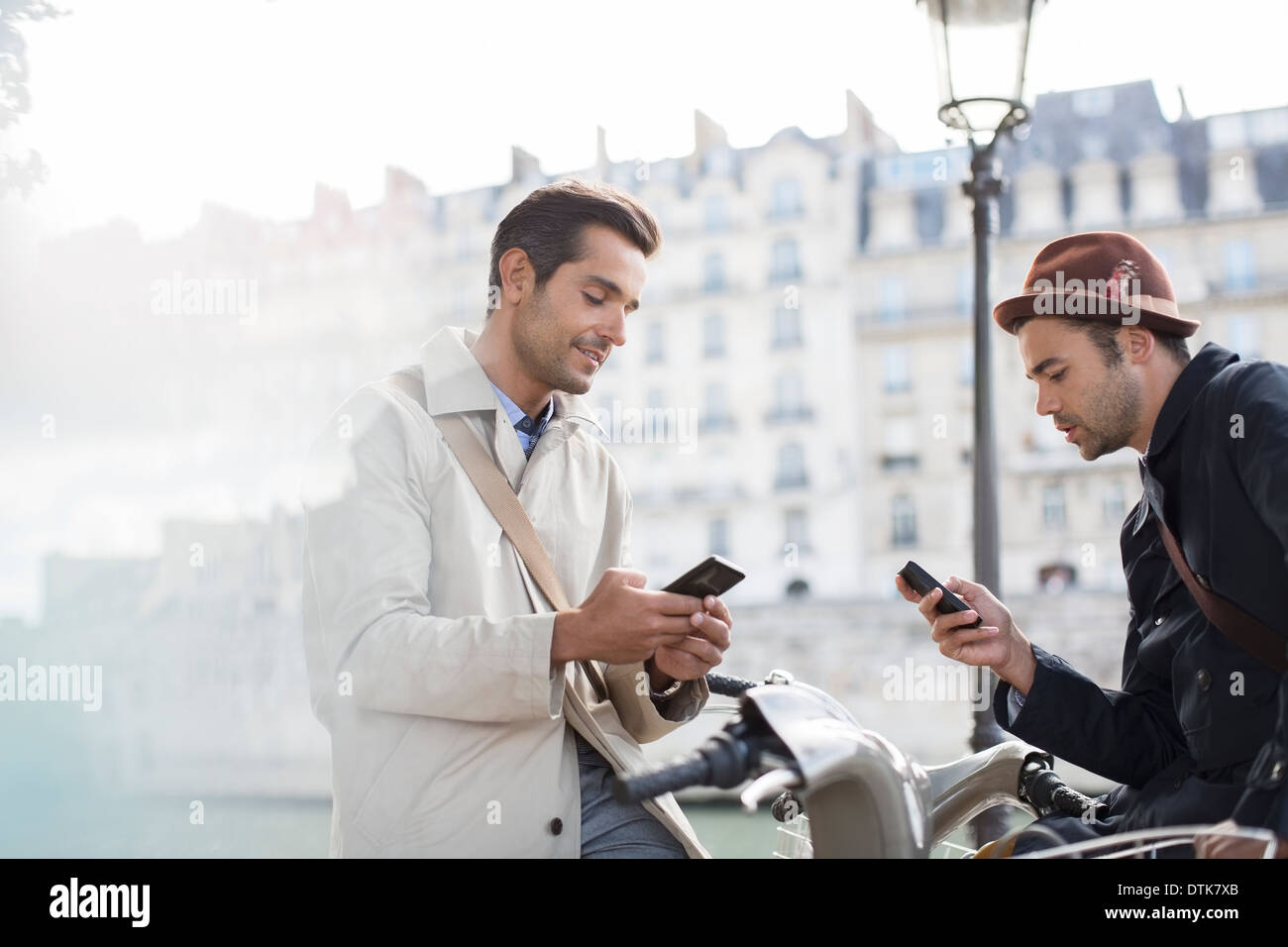 Using two cell phones hi-res stock photography and images - Alamy