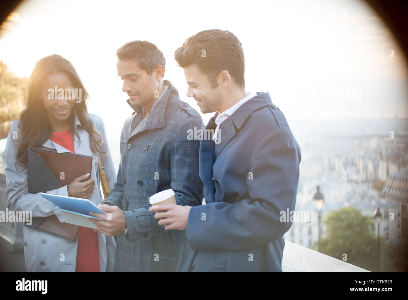 Business people talking outdoors Stock Photo - Alamy