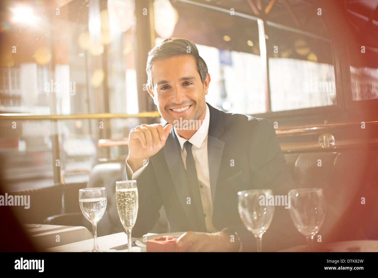 Businessman celebrating his success and smiling Stock Photo - Alamy