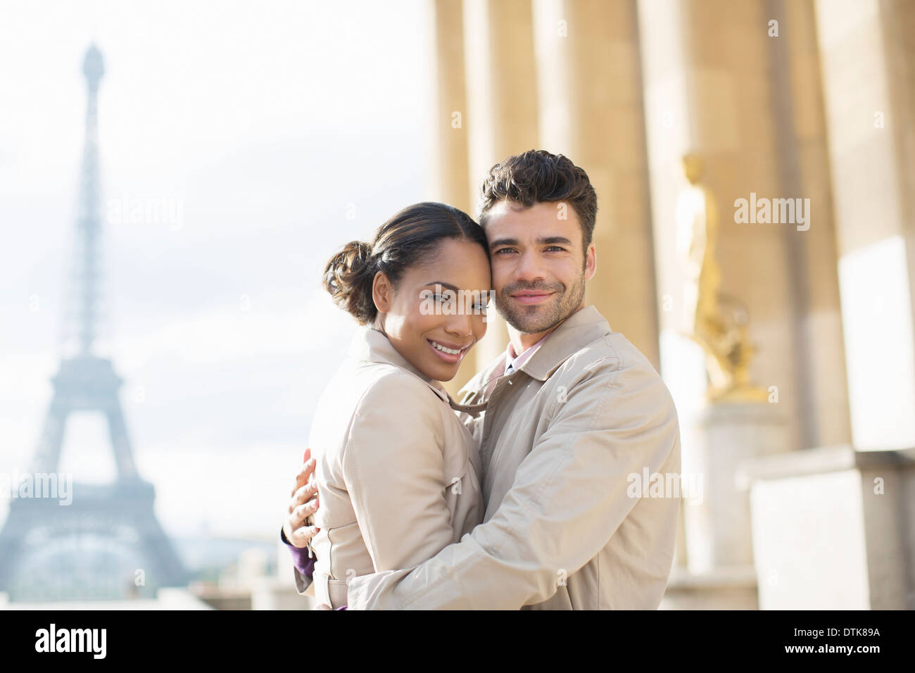 Couple hugging near Eiffel Tower, Paris, France Stock Photo - Alamy