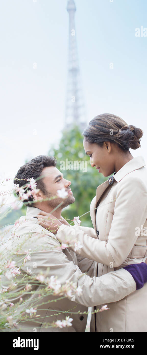 Couple hugging in front of Eiffel Tower, Paris, France Stock Photo - Alamy