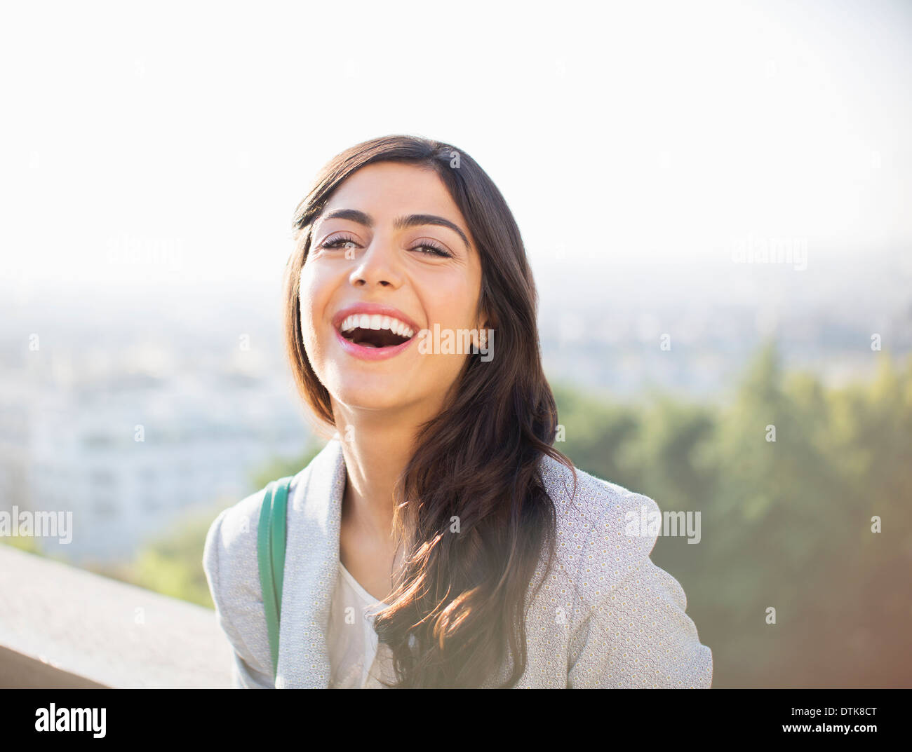 Woman sunny laughing carefree hi-res stock photography and images - Alamy
