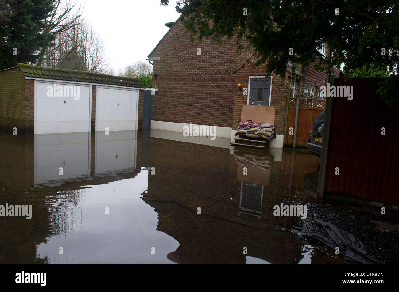 Flooded residential area and park in Staines. Driveway totally flooded ...