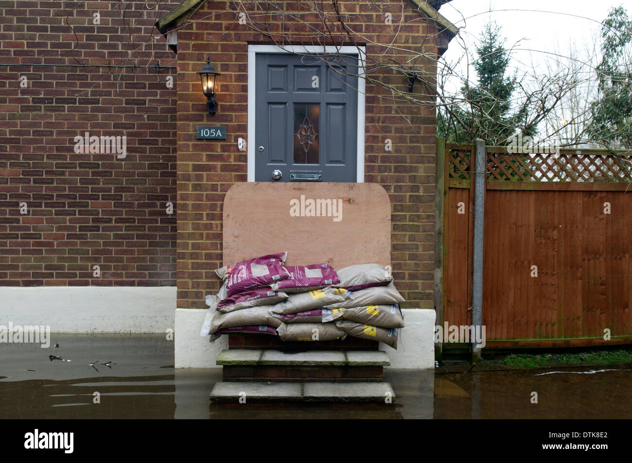 Flooded residential area and park in Staines. Driveway totally flooded ...