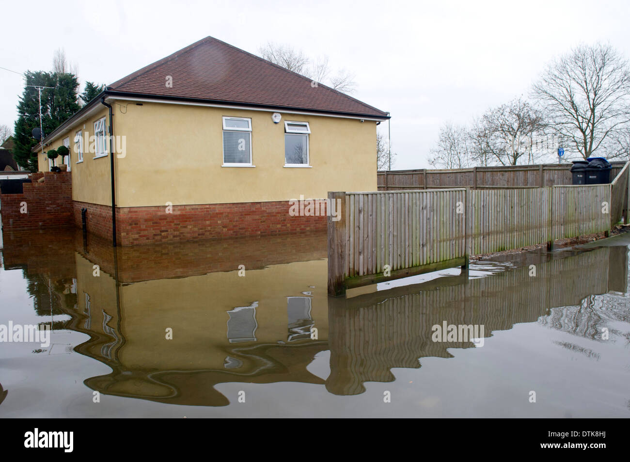 Flooded residential area and park in Staines. Driveway and streets ...