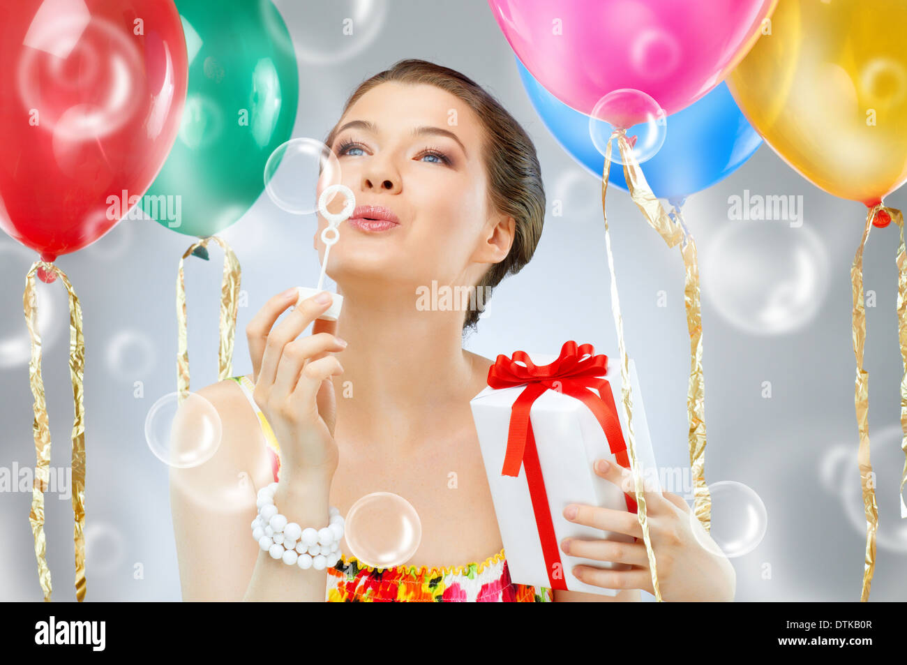 Pretty girl with color balloons Stock Photo - Alamy