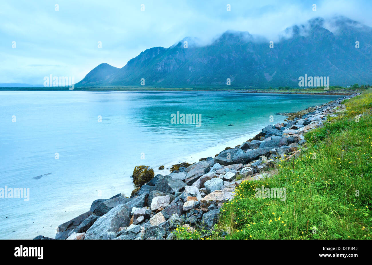 Norwegian Sea cloudy night view with sandy beach (not far Vagan, Norway ...
