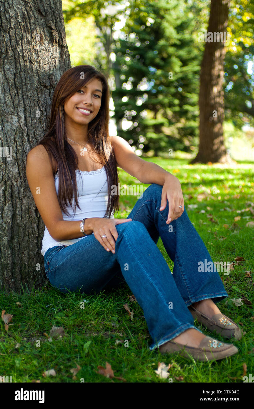 Sitting under a tree hi-res stock photography and images - Alamy