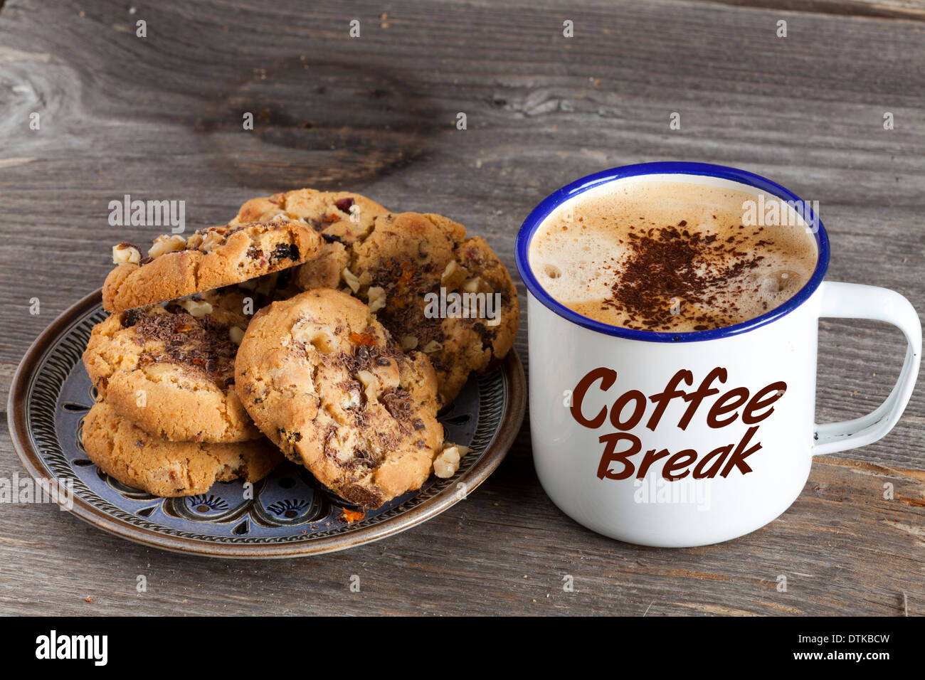 Plate of cookies and a pot of coffee with the words "Coffee Break" on a ...