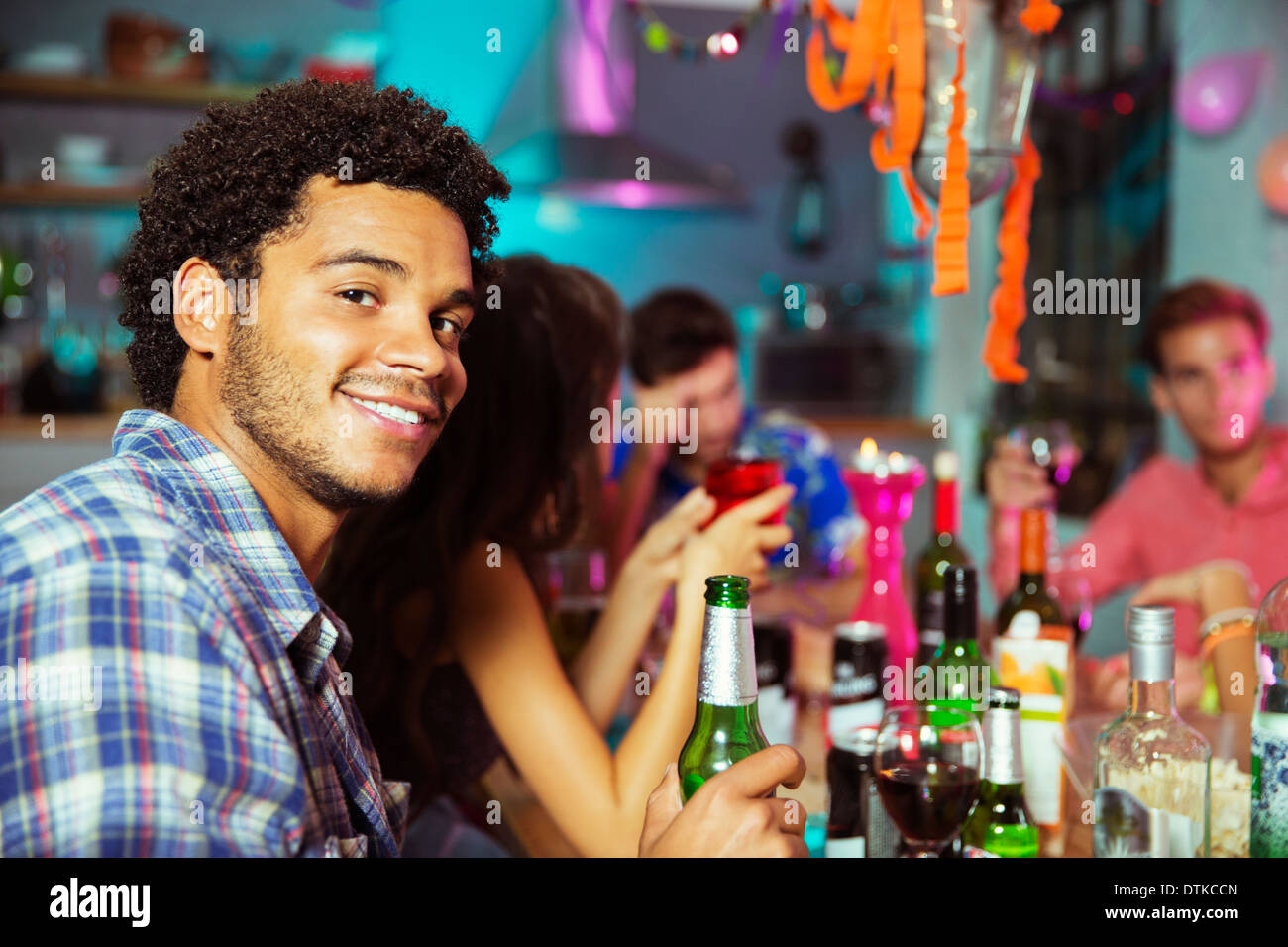 Man smiling at party Stock Photo - Alamy