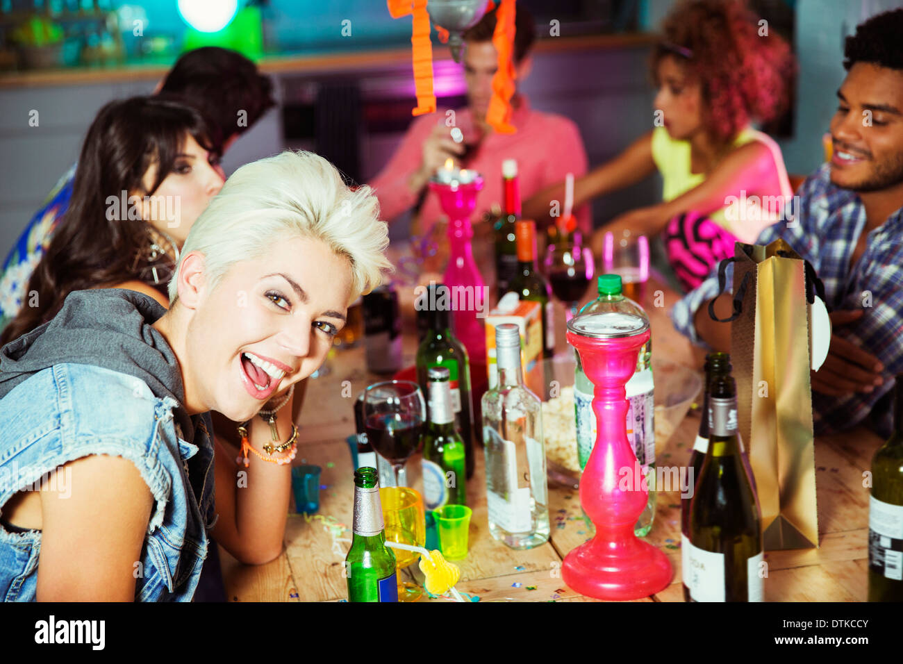 After table party woman hi-res stock photography and images - Alamy
