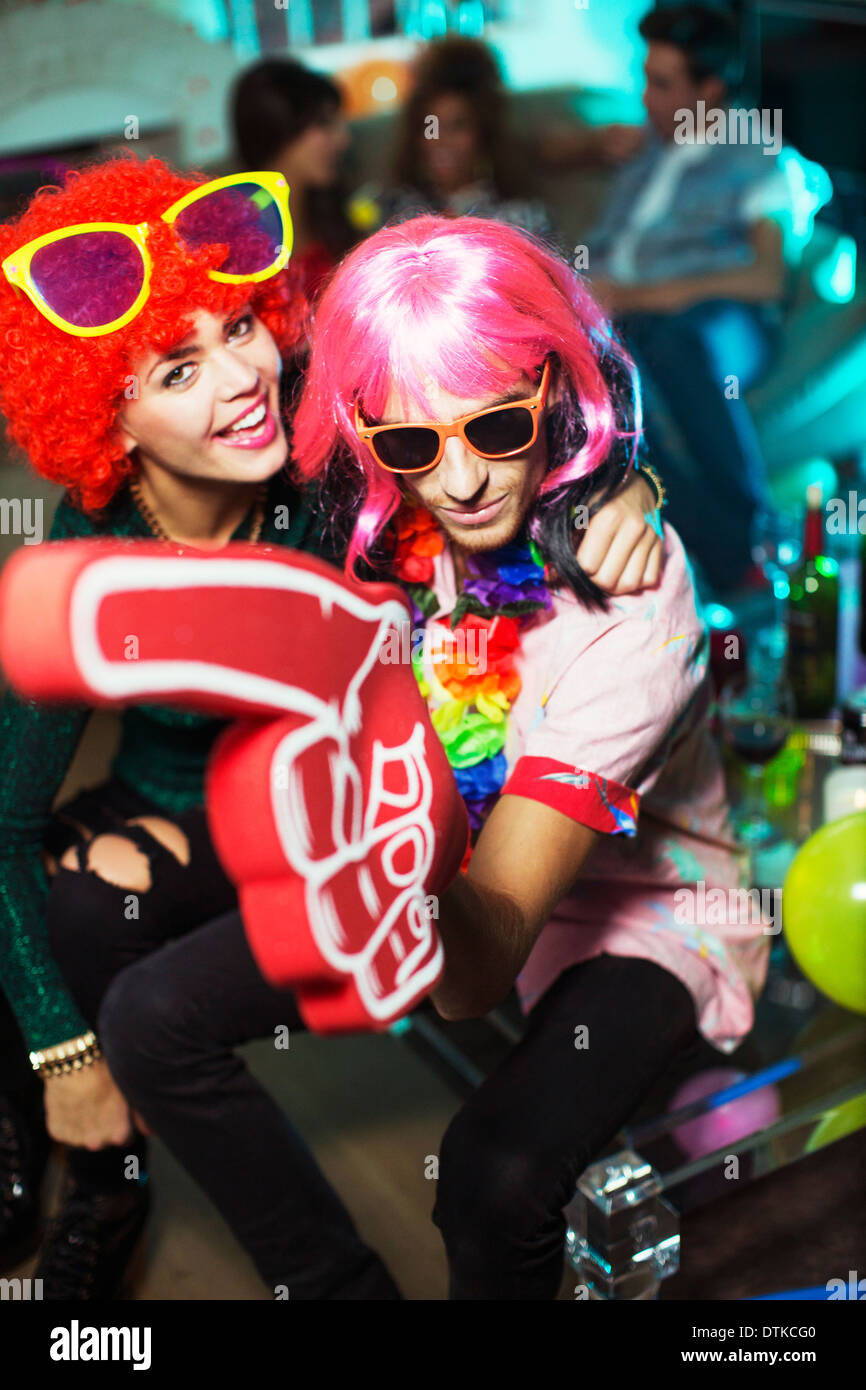 Couple wearing costumes at party Stock Photo - Alamy