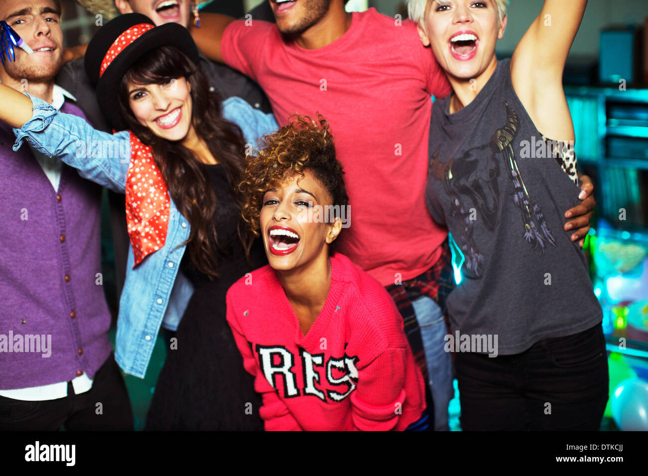 Laughing men posing at party at night hi-res stock photography and ...