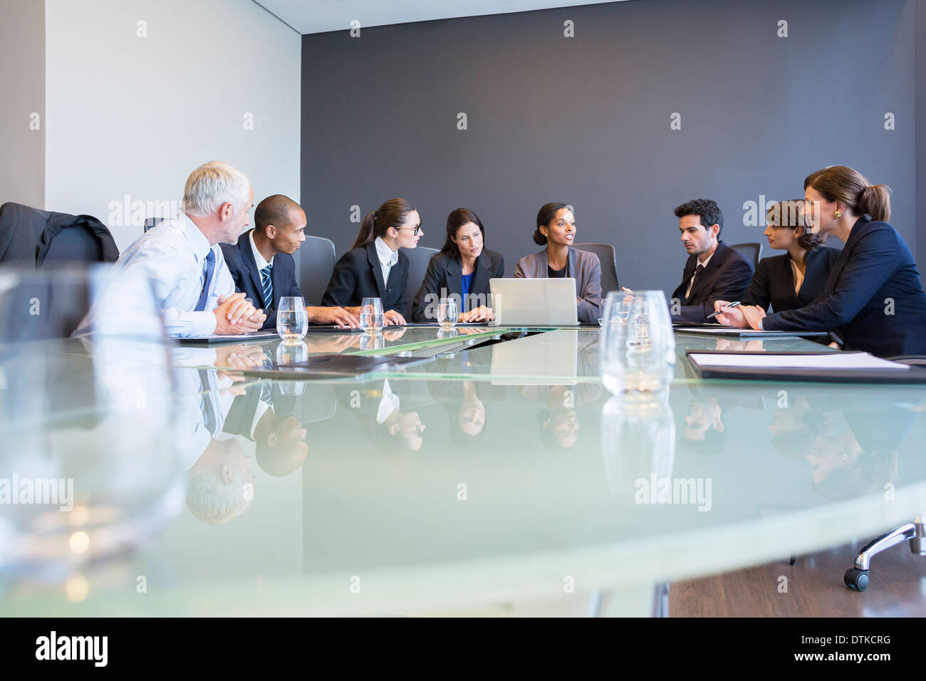 Business people talking in meeting Stock Photo - Alamy