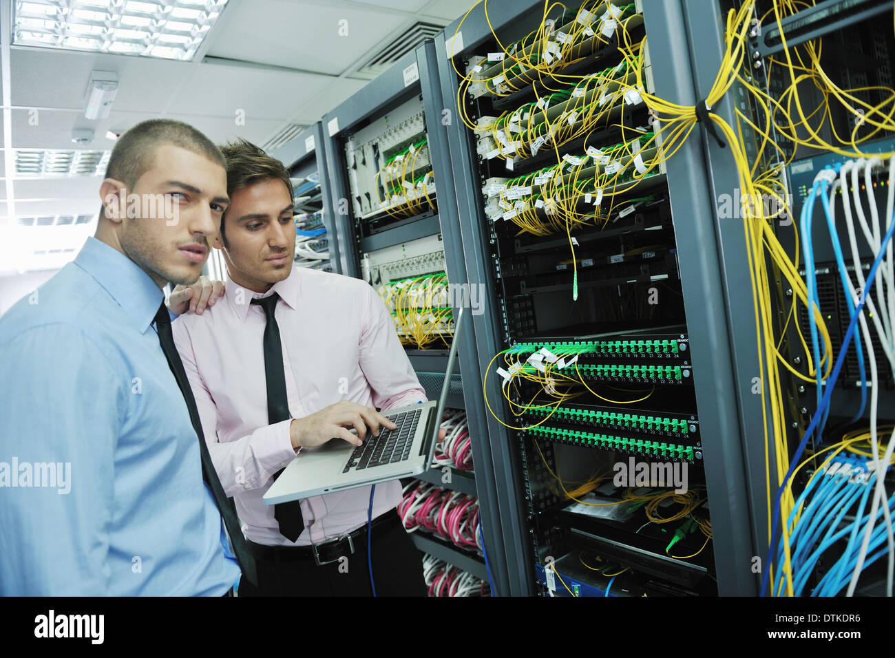 it engineers in network server room Stock Photo - Alamy