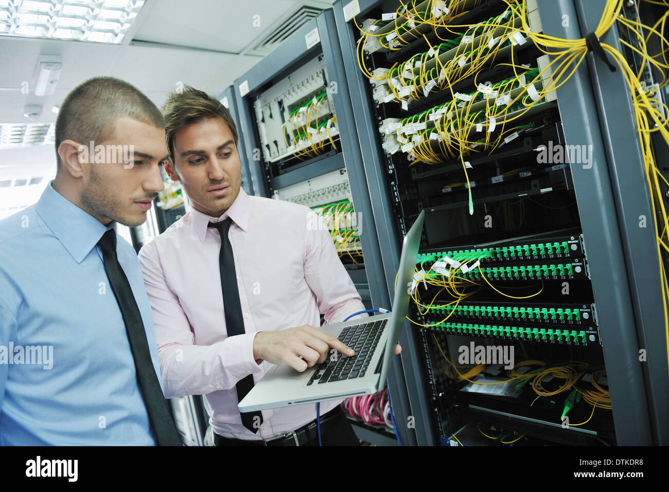 it engineers in network server room Stock Photo - Alamy