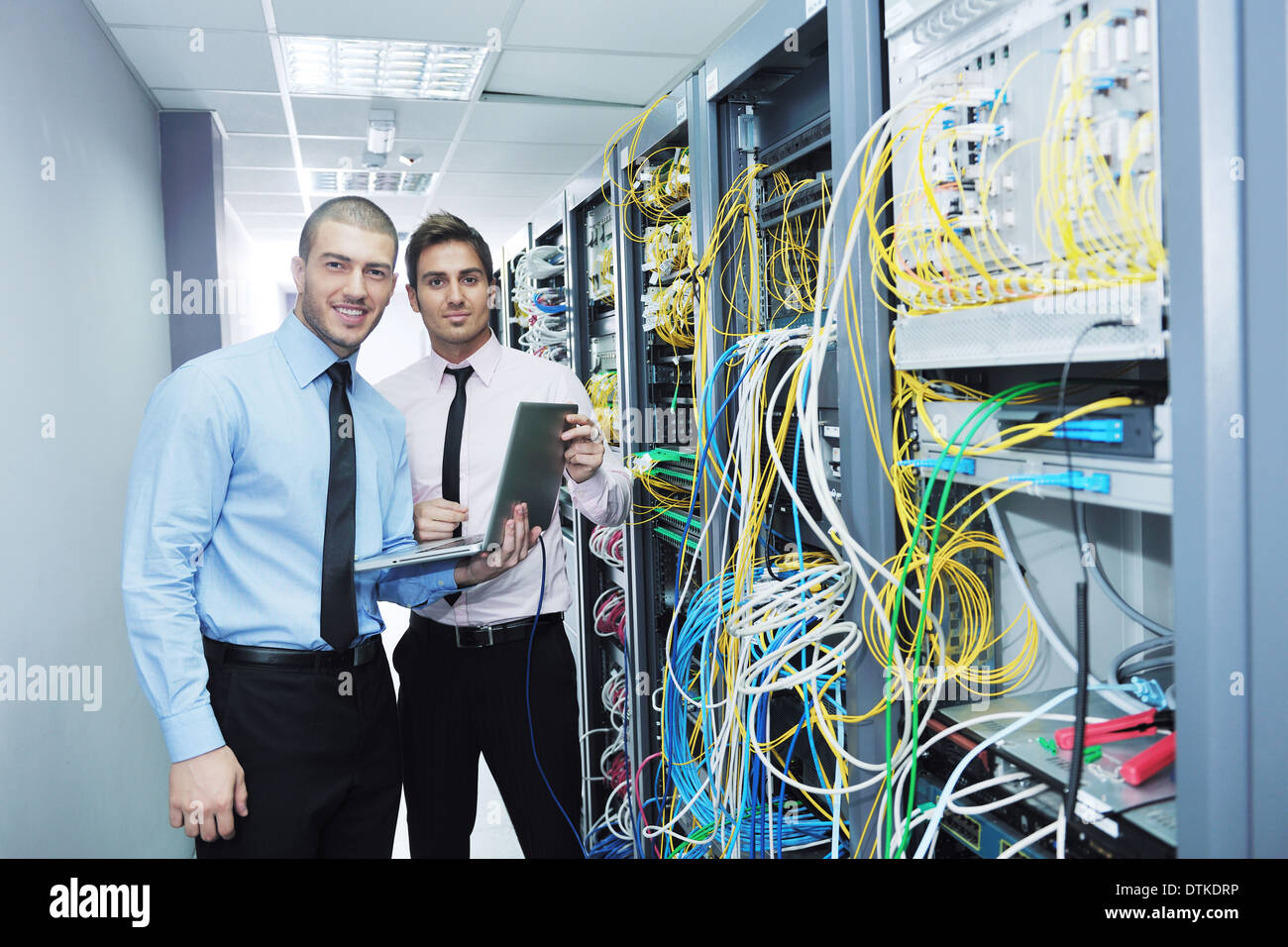 it engineers in network server room Stock Photo - Alamy