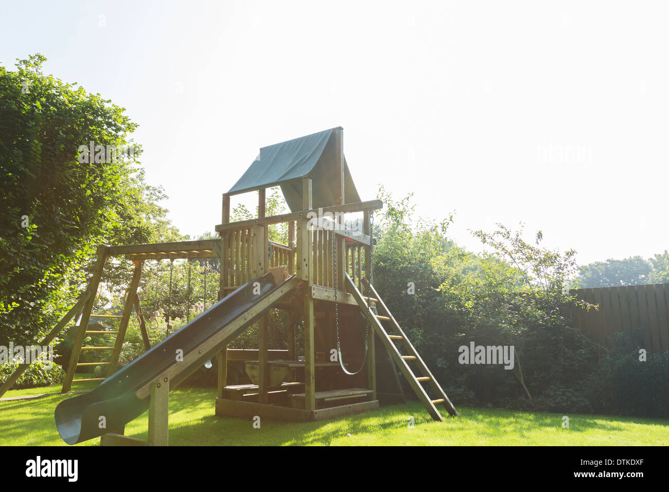 Play structure in backyard Stock Photo - Alamy